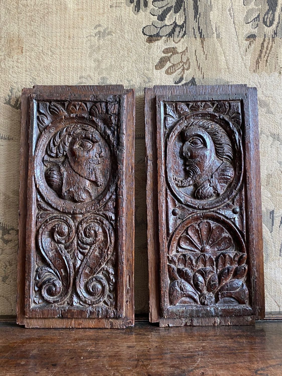 A fINE PAIR OF 16TH CENTURY CARVED OAK ROMAYNE PANELS