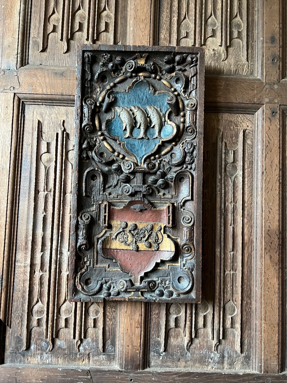 18th century carved oak armorial panel