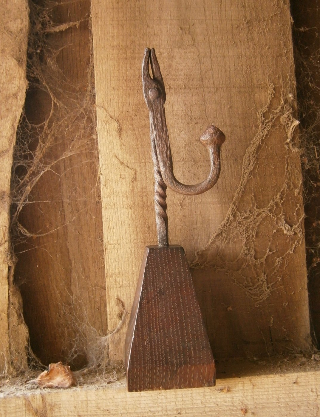 17th century Welsh rushnip .rushlight rush holder.