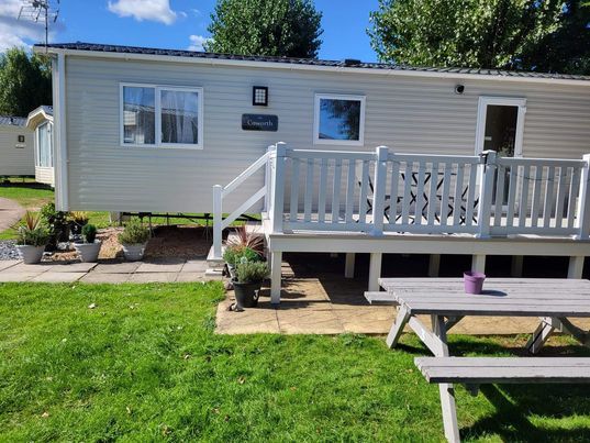 photos of all the caravans and log cabin