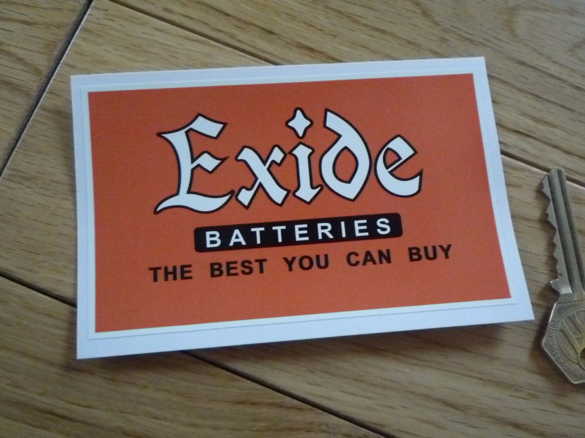 Exide Circular White on Matt Black Battery Sticker 3"