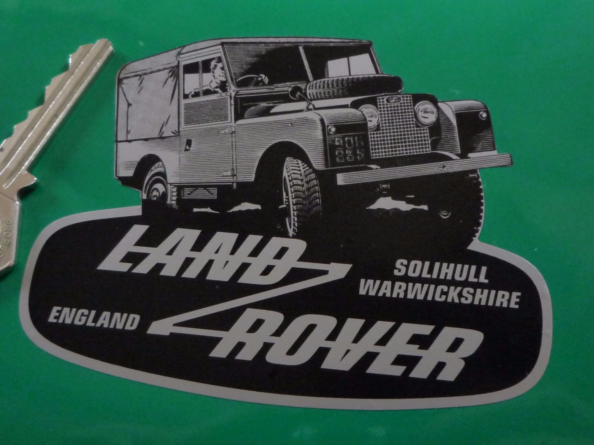 Land Rover Defender & Logo Shaped Self Adhesive Car Badge. 3".