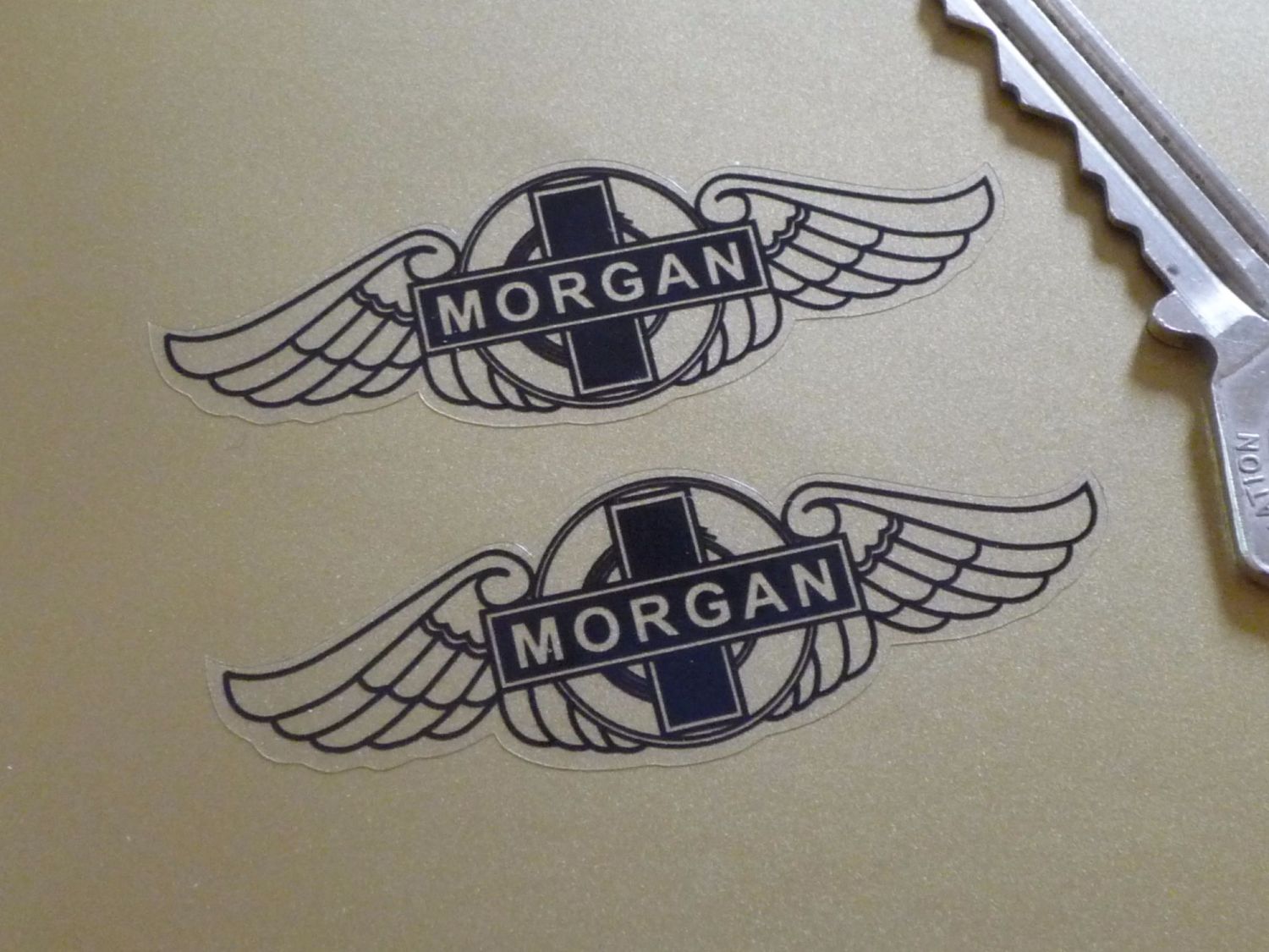 Morgan Winged Logo Sticker. 6" or 9".