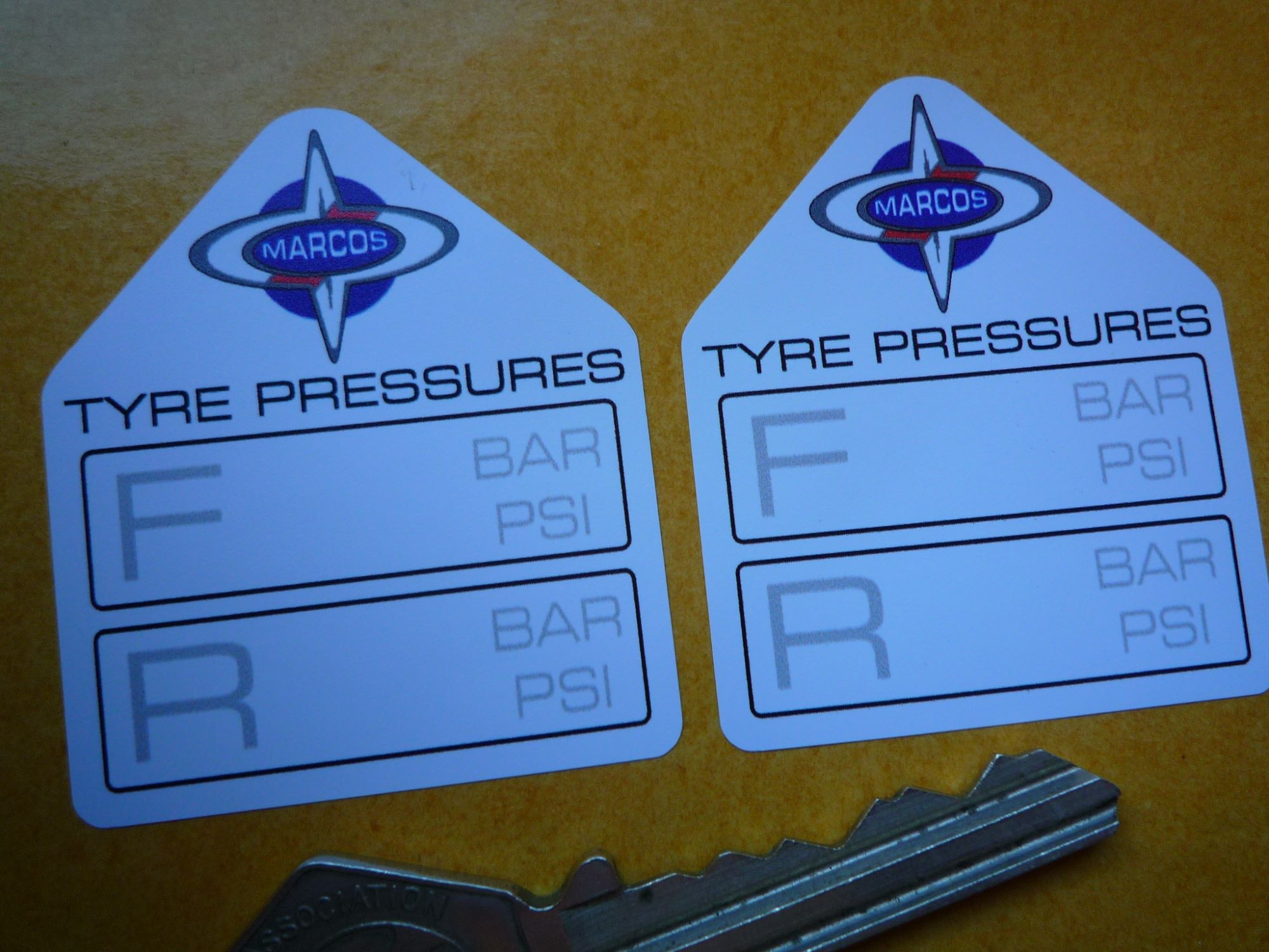Marcos Logo Shaped Stickers. 1" or 2" Pair.
