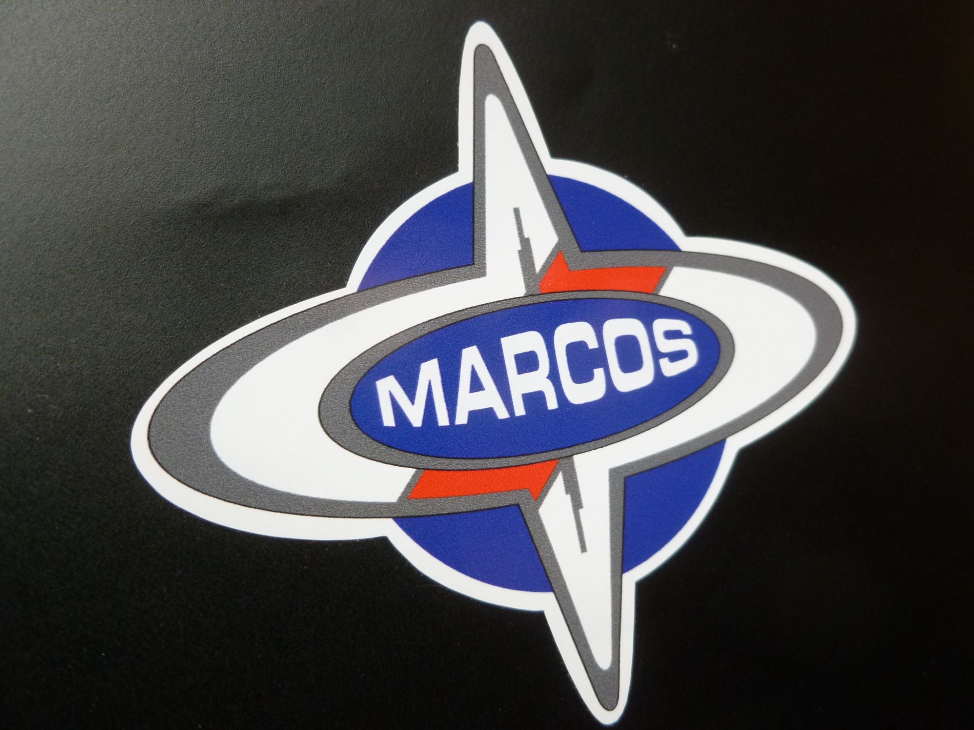 Marcos Logo Shaped Stickers. 1" or 2" Pair.