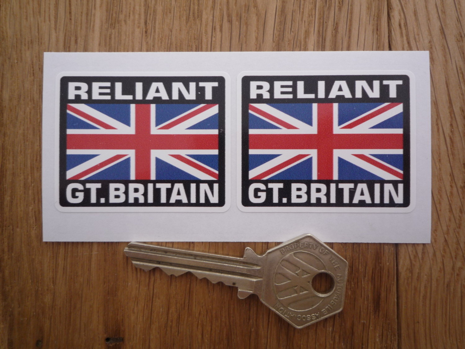 Reliant Flag & Scroll Sticker. 3.75".