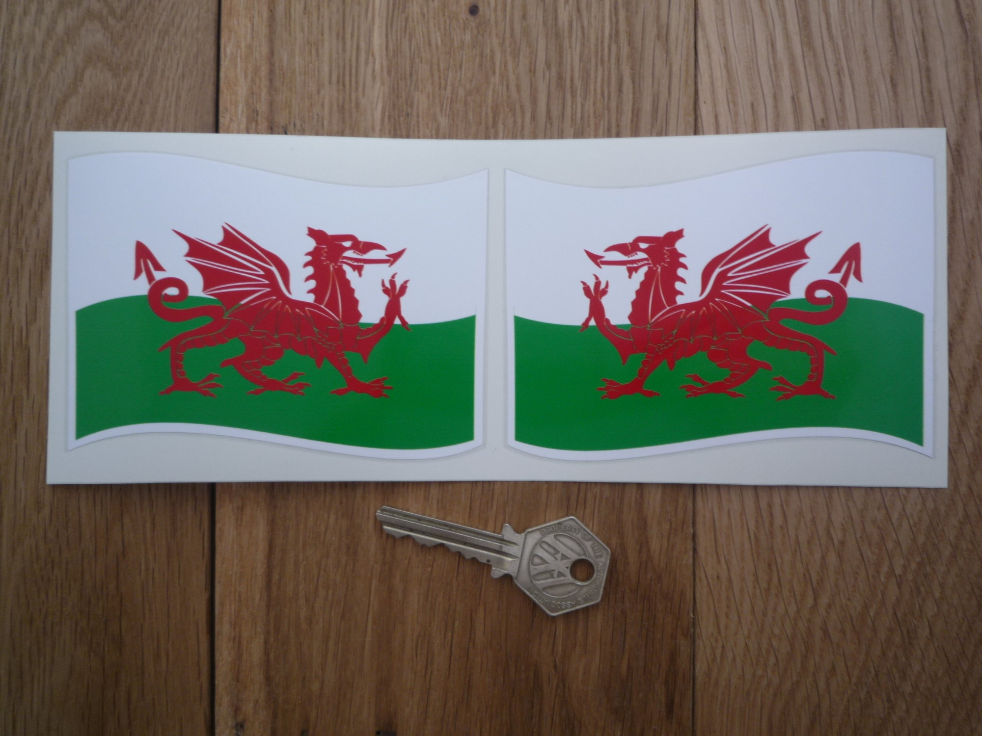 Welsh Dragon Flag Fade To Black Oval Stickers. 3" Pair.