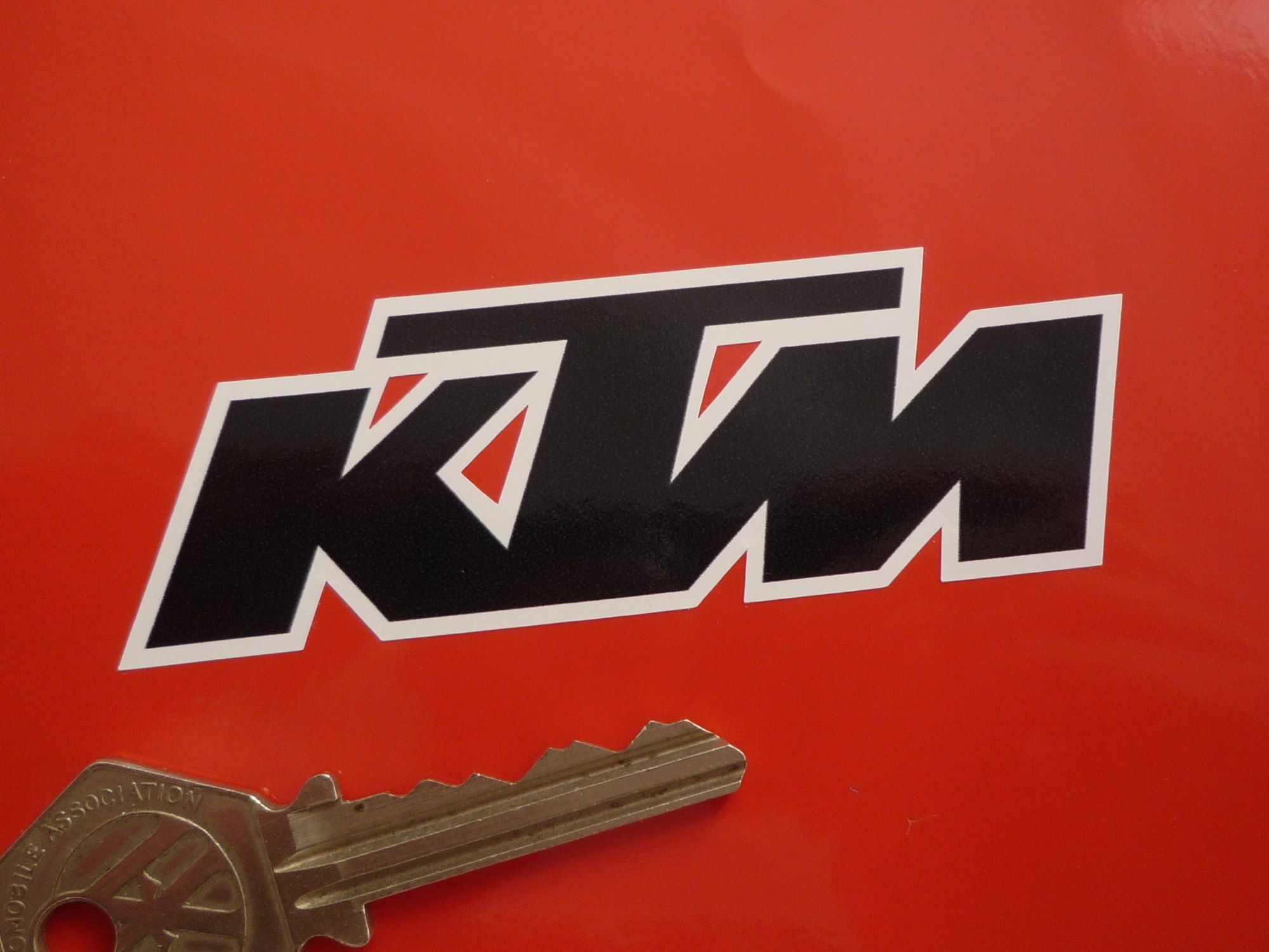 KTM Stylised Script Cut Vinyl Sticker. 4".