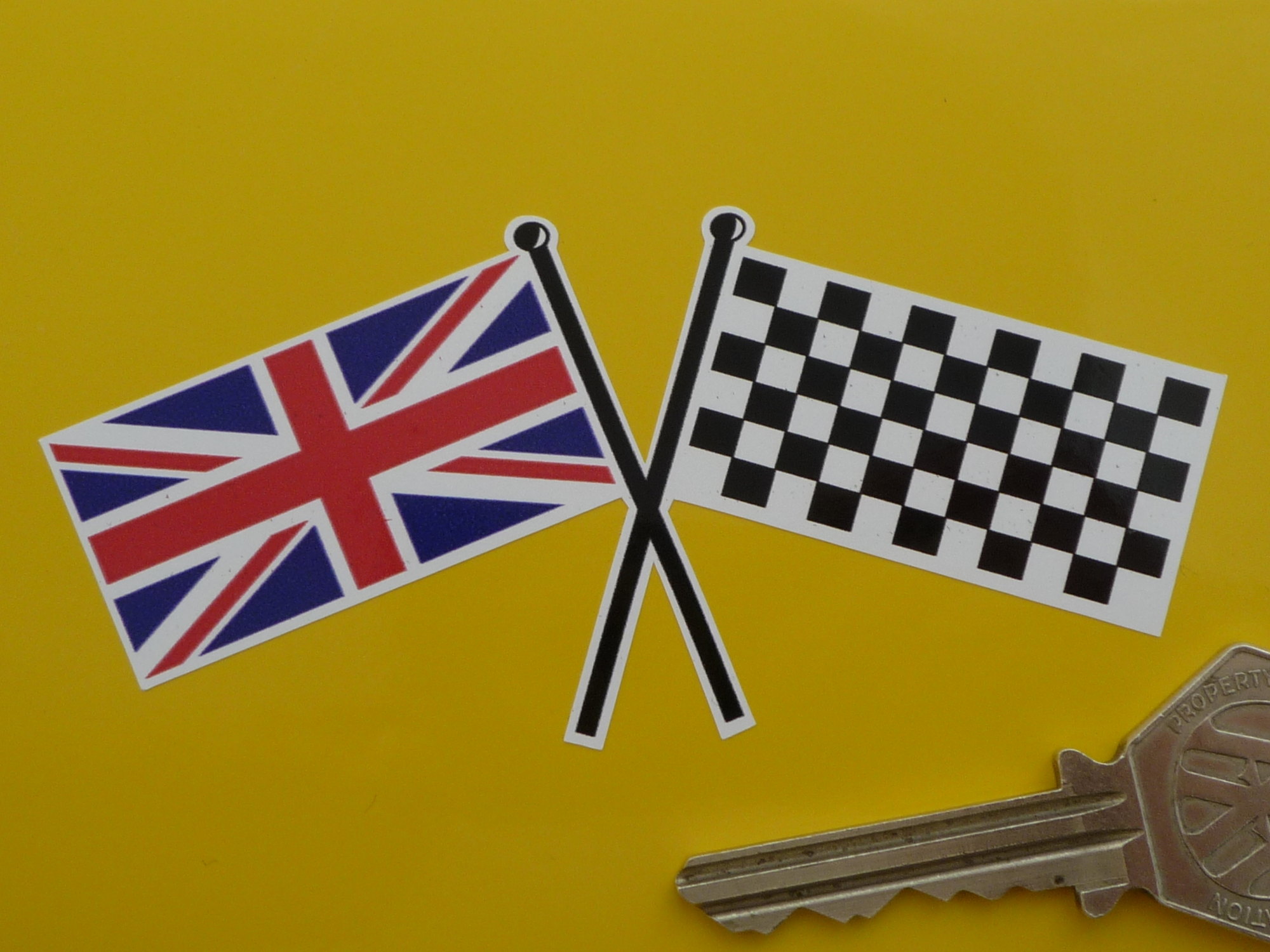 Union Jack & Chequered Crossed Straight Flags Sticker. 4".