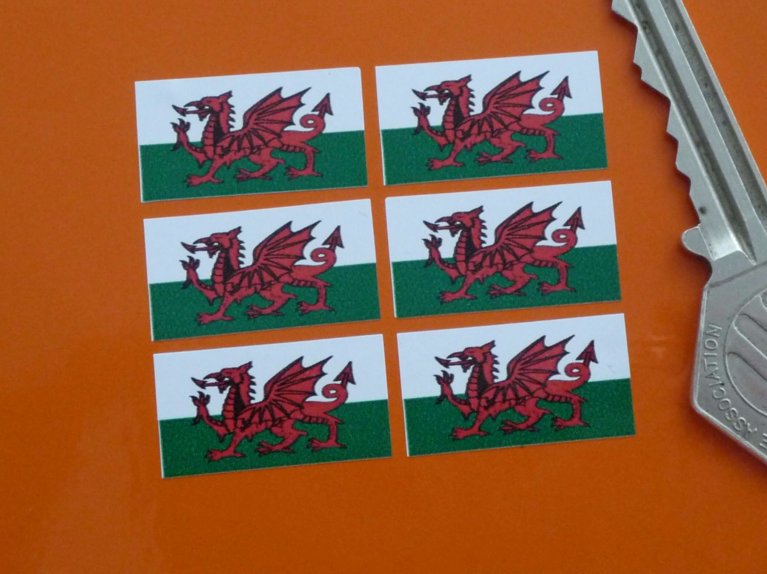 Welsh Dragon Flag Fade To Black Oval Stickers. 3" Pair.