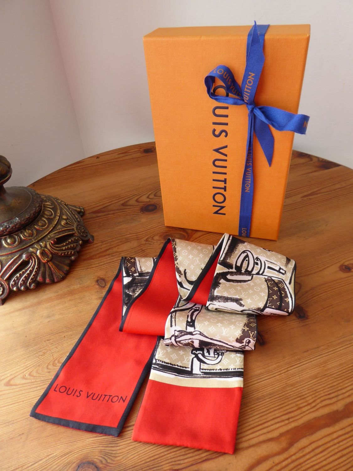 Louis Vuitton Silk Bandeau Monogram Trunks Twilly SOLD Louis Vuitton Silk Bandeau Monogram Trunks Twilly SOLD