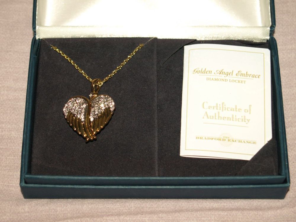 The Bradford Exchange ‘Guardian Angel Embrace’ Diamond Locket. Boxed.