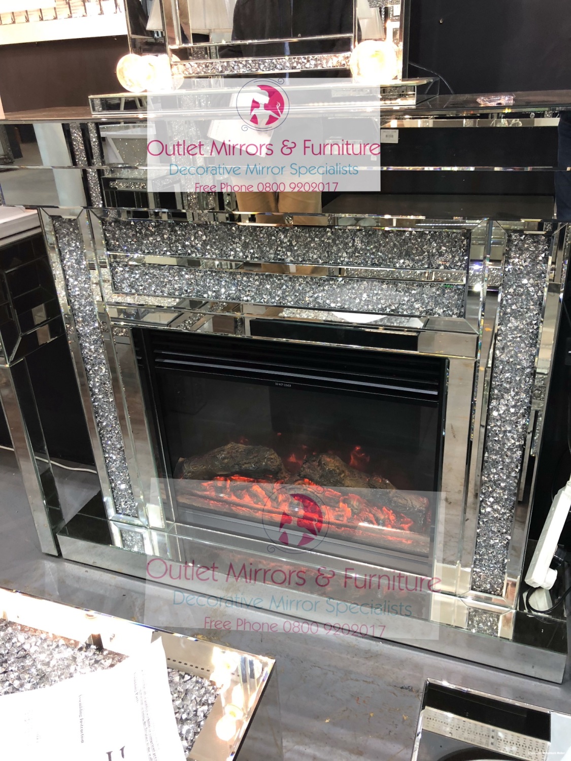 Diamond crush fire surround with fire