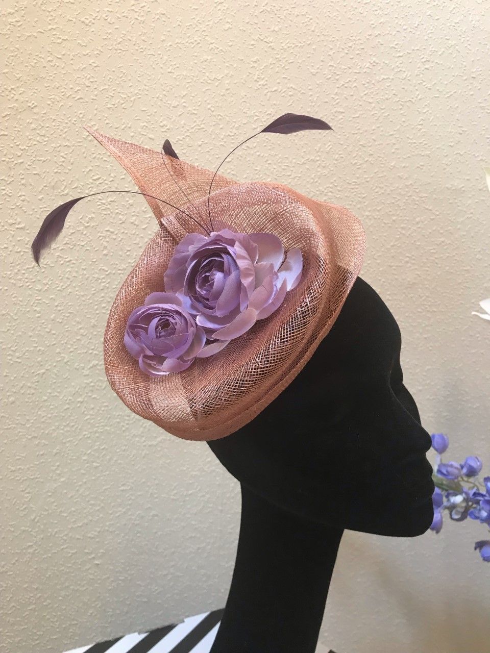 A handmade unique blush and mauve medium size fascinator