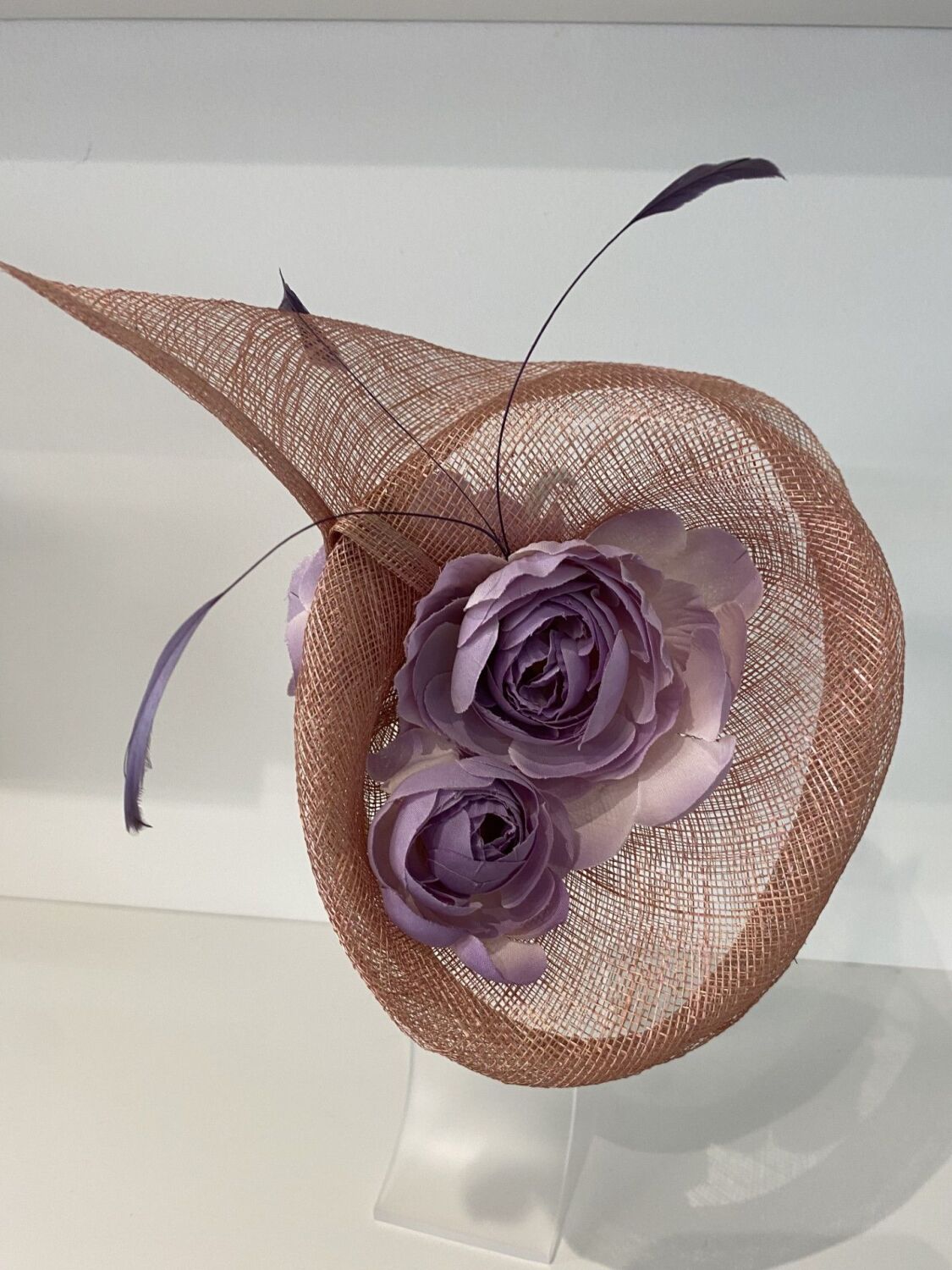 A handmade unique blush and mauve medium size fascinator
