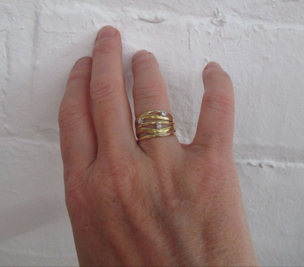 'Doddle Ring' hand made with white diamonds and 18 carat yellow gold.