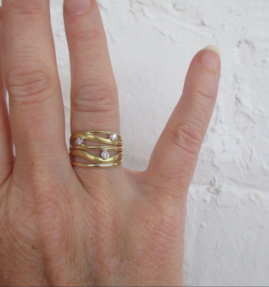 'Doddle Ring' hand made with white diamonds and 18 carat yellow gold.