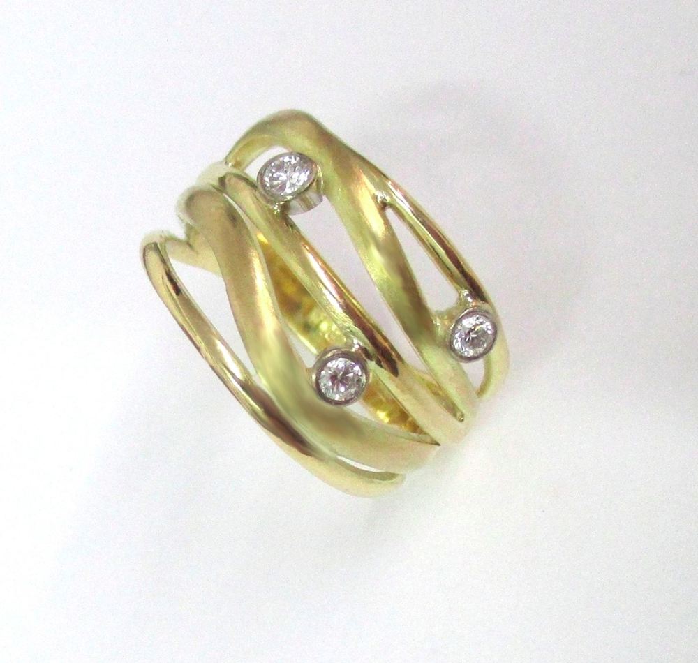'Doddle Ring' hand made with white diamonds and 18 carat yellow gold.