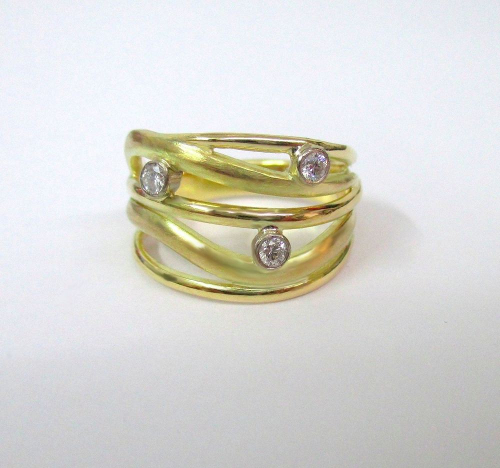 'Doddle Ring' hand made with white diamonds and 18 carat yellow gold.