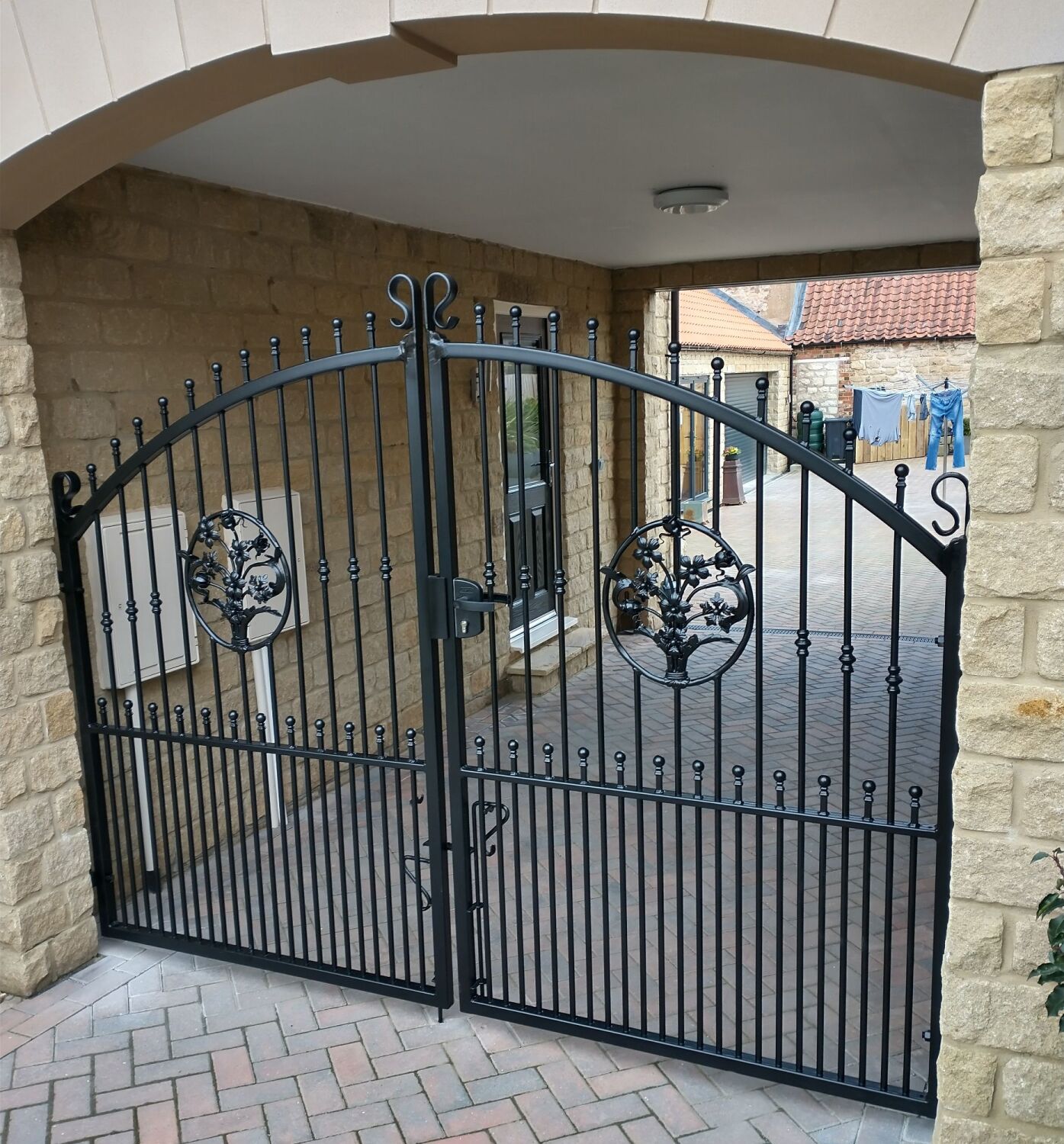 Double gates attached to existing posts or solid structure