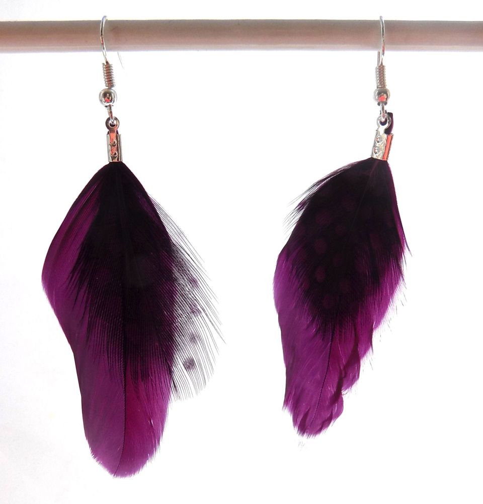 Feather earrings in Plum Purple
