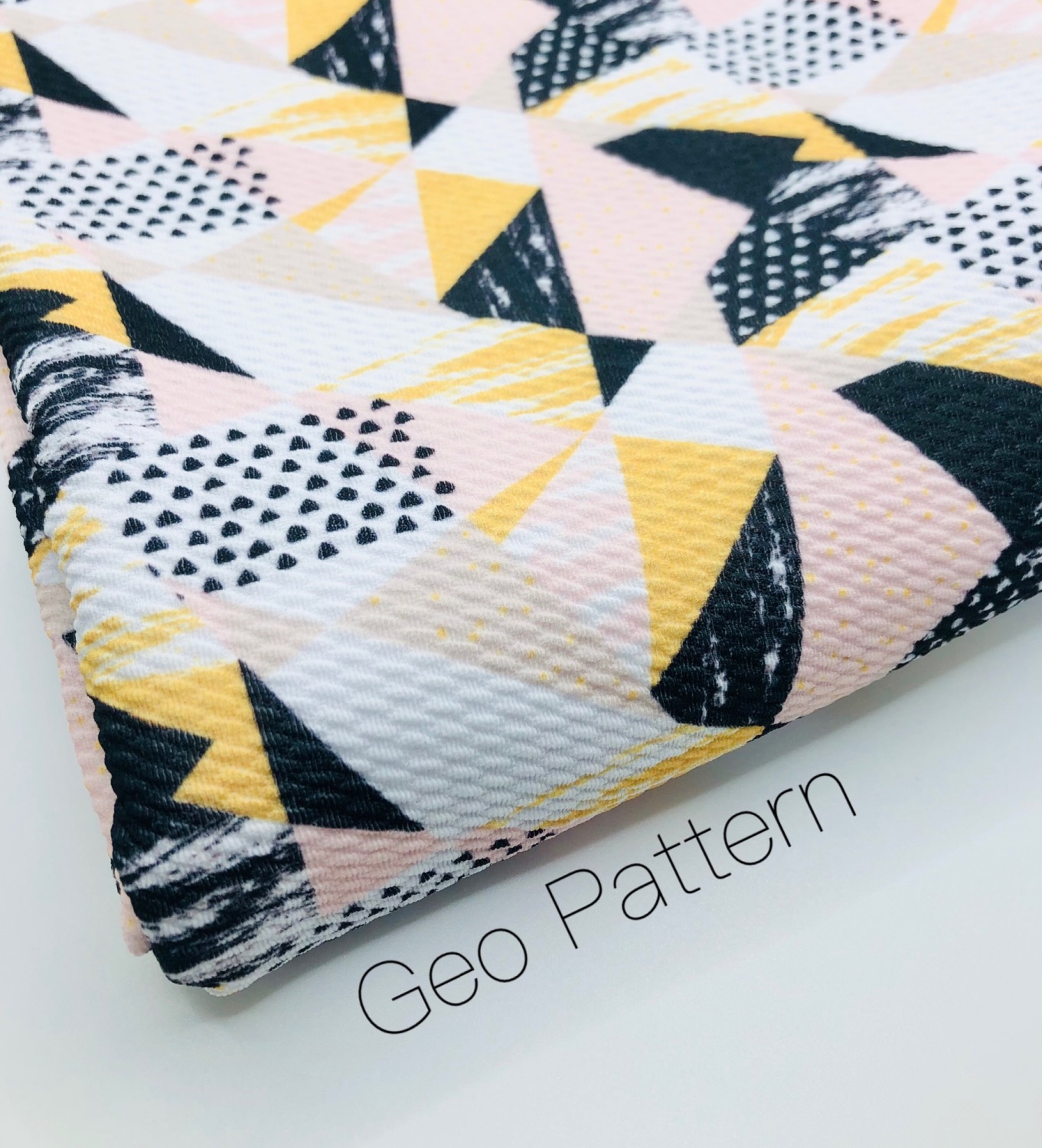 Geo pattern shape printed bullet liverpool stretch fabric