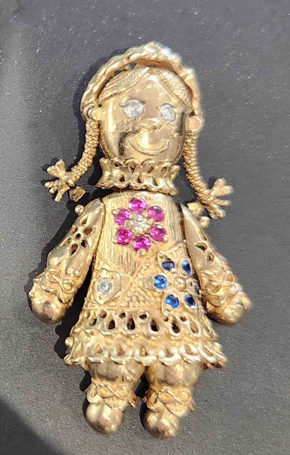 9ct Yellow Gold Rag Doll Pendent weighing 18.4 grms