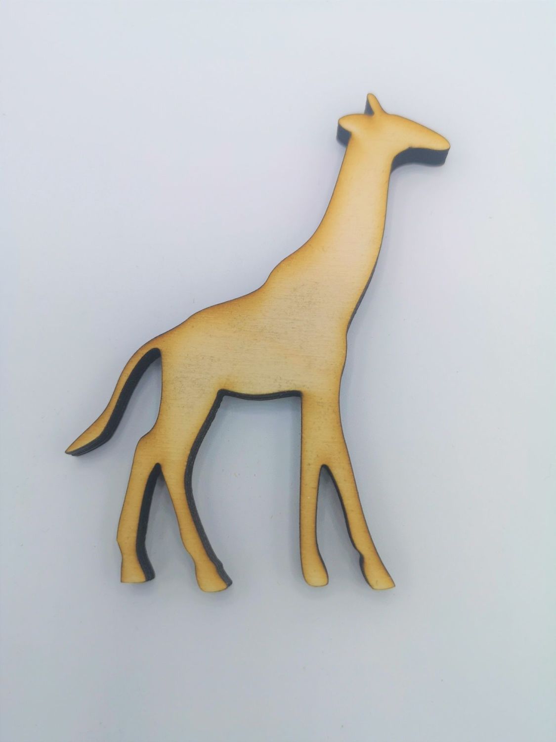 Laser cut wooden animal shapes.