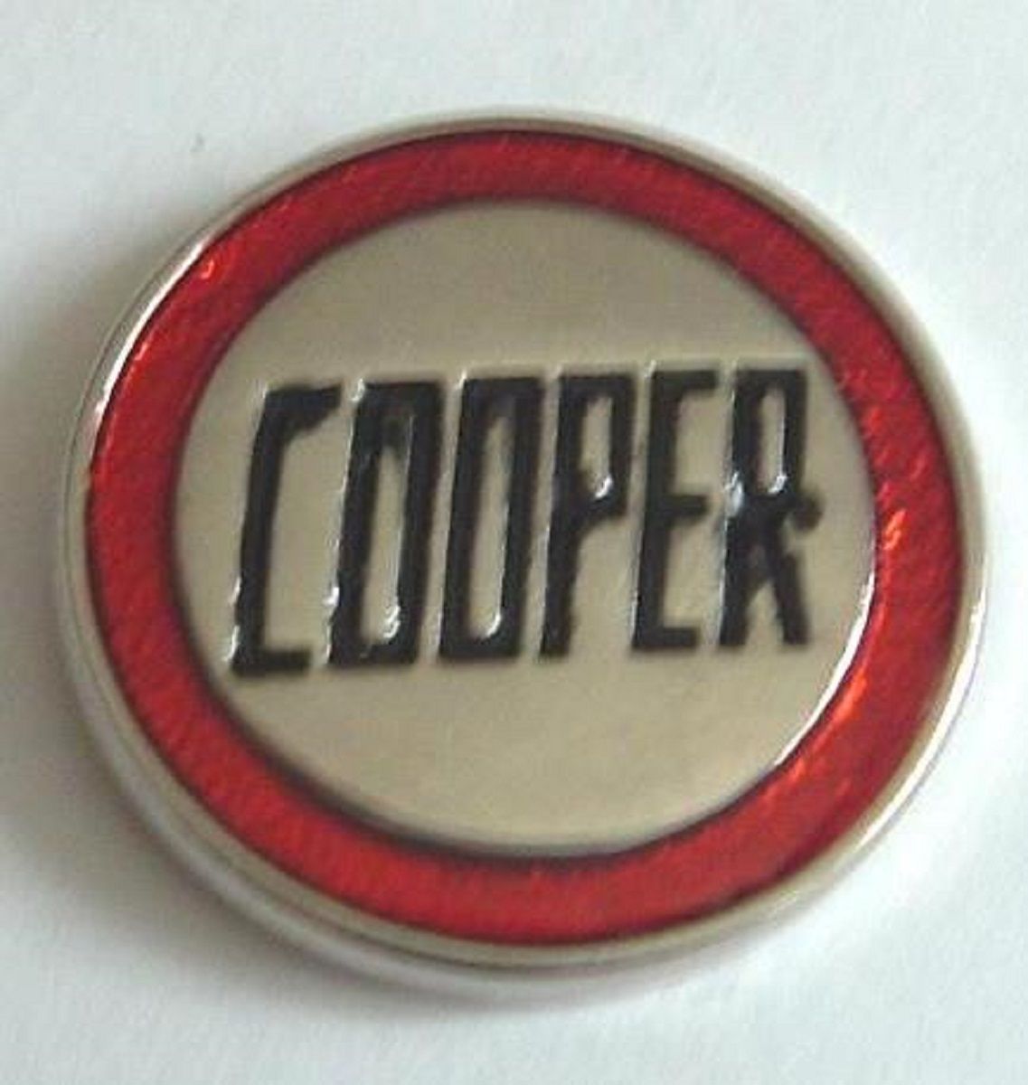Cooper lapel pin badge