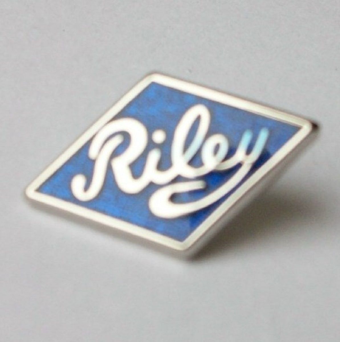 Riley lapel pin badge